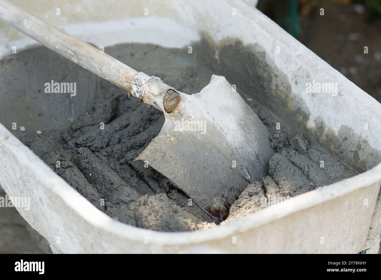 Construction Wheelbarrow Full of Cement with Shovel close up Stock ...