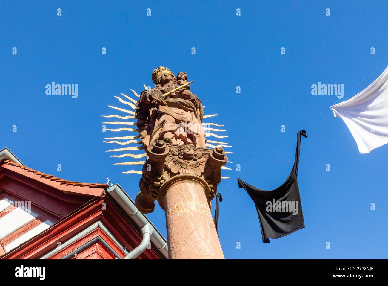 Marian column with mary and baby Jesus in Amorbach, Germany under blue ...
