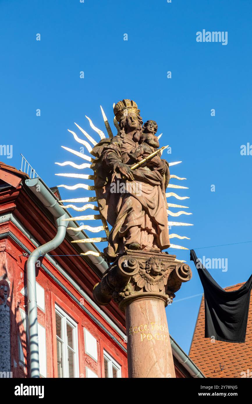 Marian column with mary and baby Jesus in Amorbach, Germany under blue ...