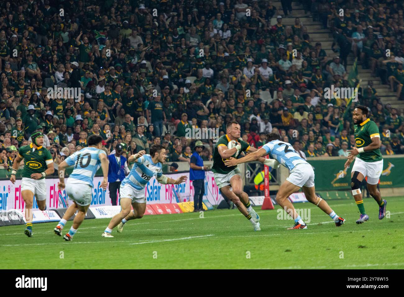 Jesse Kriel with the ball and Lukanyo Am in support durig the during ...