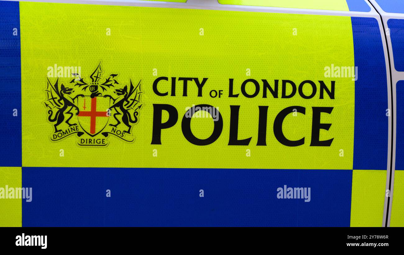 London, UK - September 18, 2024; City of London Police sign with coat ...