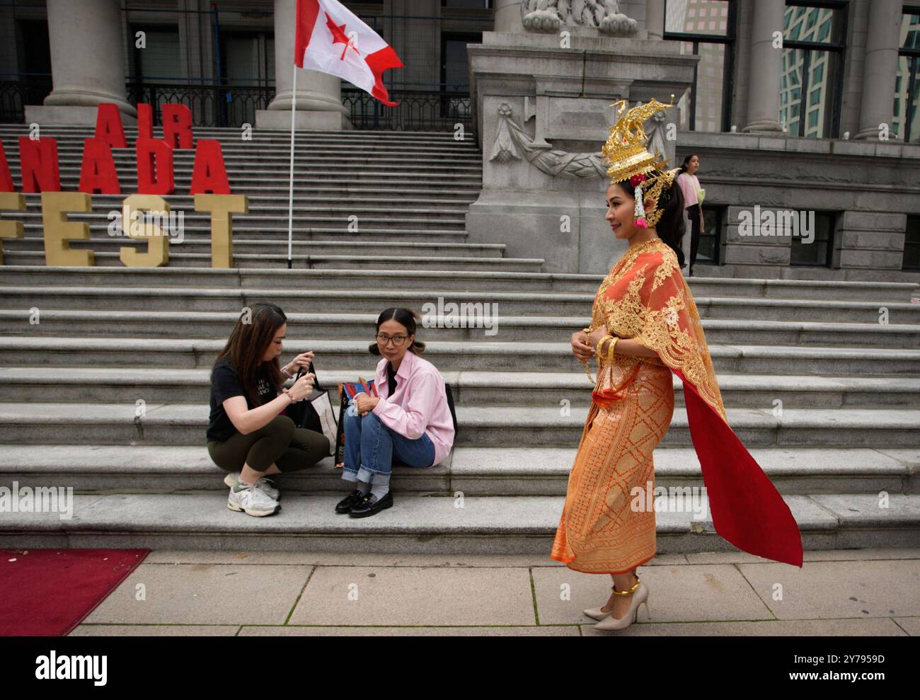 Vancouver, Canada. 28th Sep, 2024. A Thai dancer in traditional attire ...