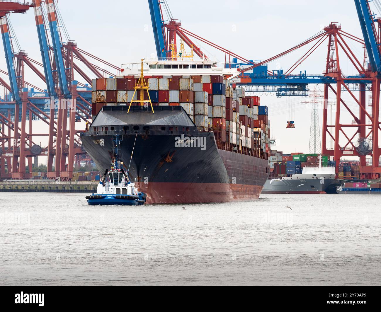 Huge ship in docks at Hamburg Harbor, Germany Stock Photo - Alamy