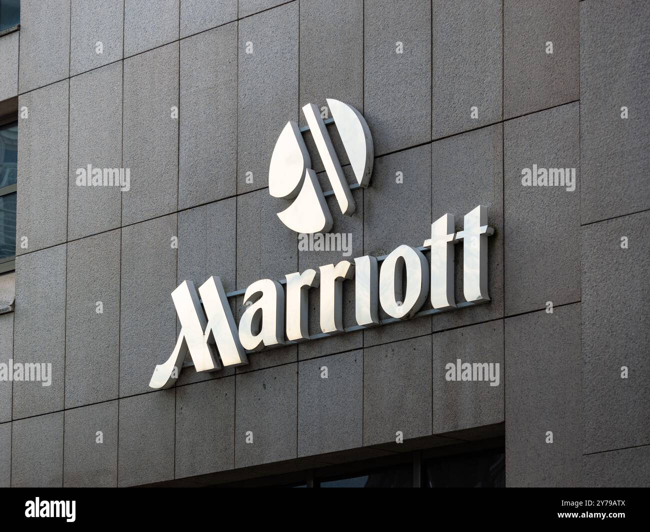 Marriott logo sign of the lodging company. Corporation in the ...