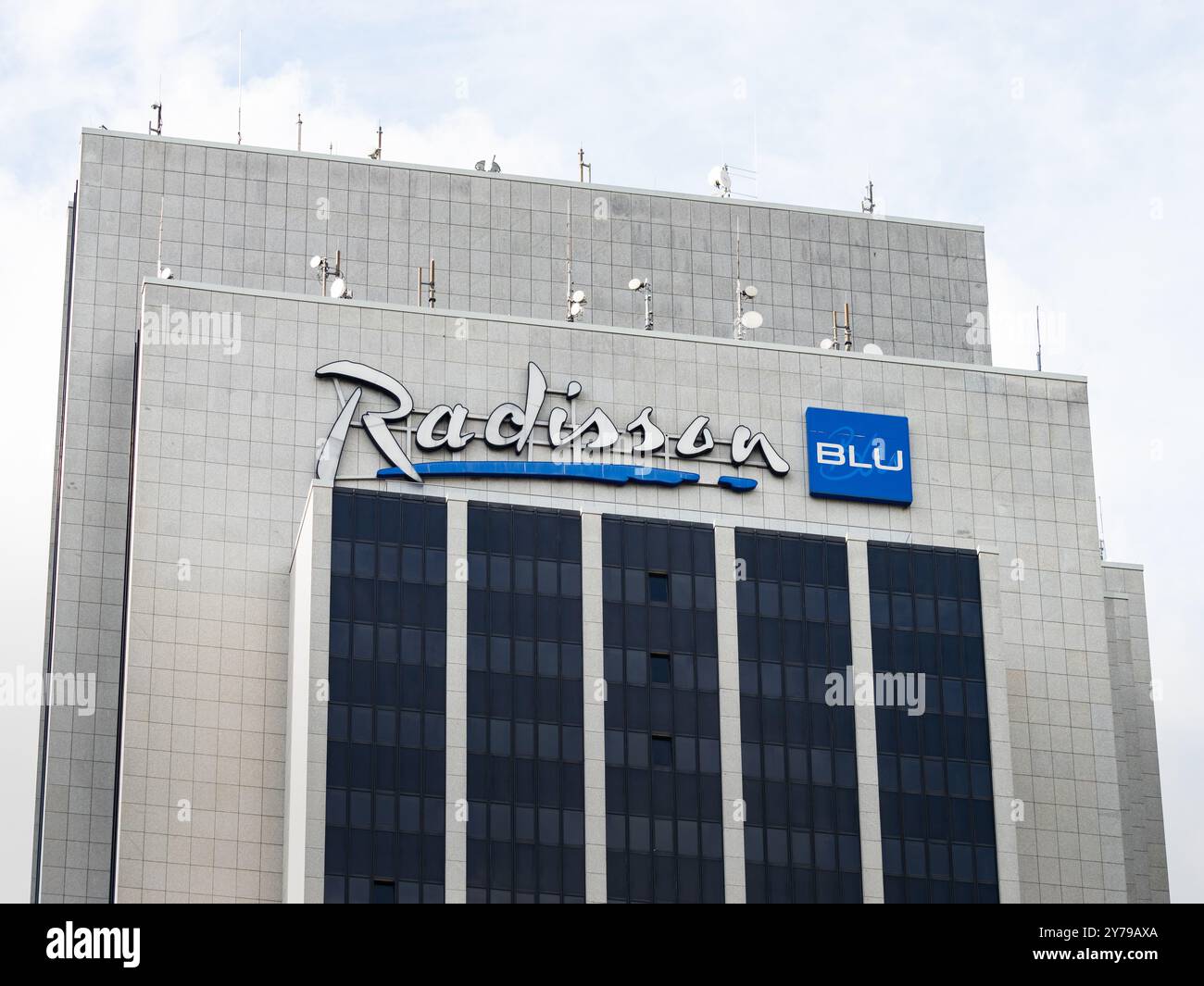 Radisson Blu logo sign of the lodging company on a hotel building next ...