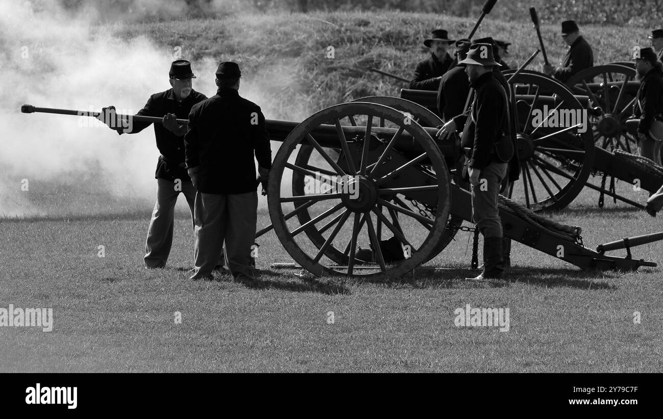 Union Army Artillerists (re-enactors) loading and firing Canons on a ...