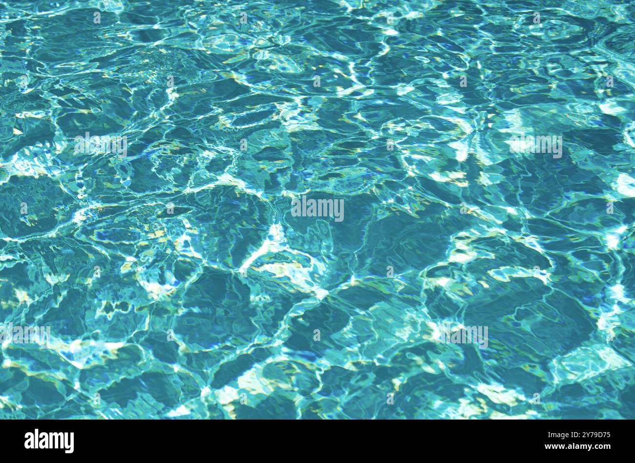 Ripple Water in swimming pool with sun reflection. Wavy water ...