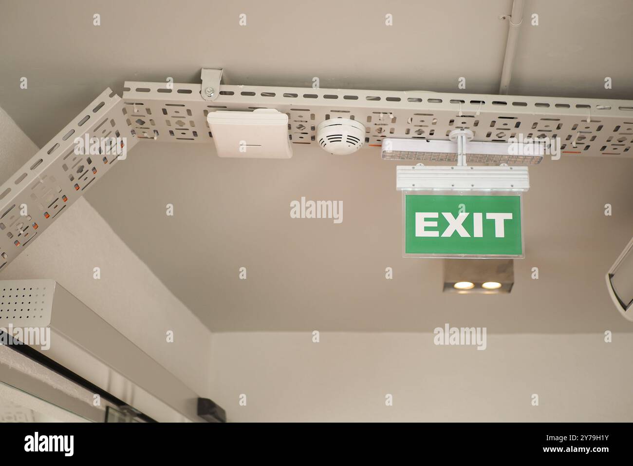 emergency exit door inside of a building Stock Photo - Alamy