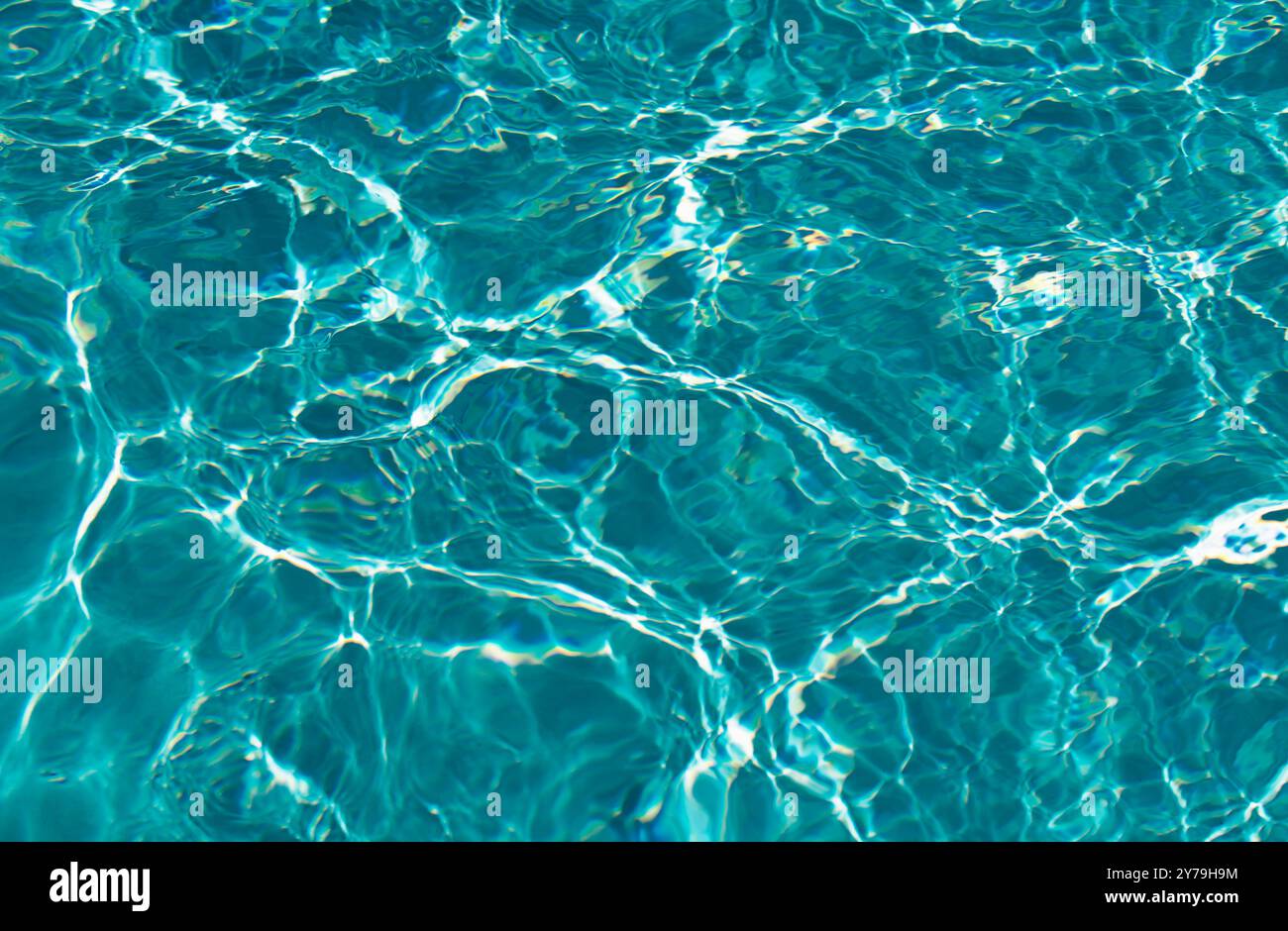 Water in swimming pool, background with high resolution. Wave abstract or rippled water texture ...