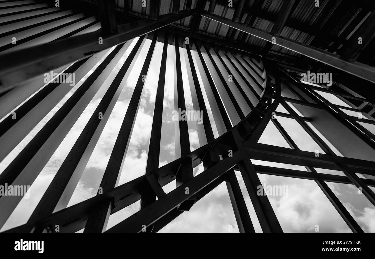 A structure featuring wooden slats on construction site contributing to ...