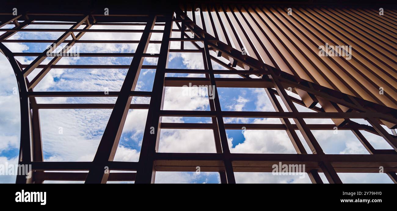 A structure featuring wooden slats on construction site contributing to ...
