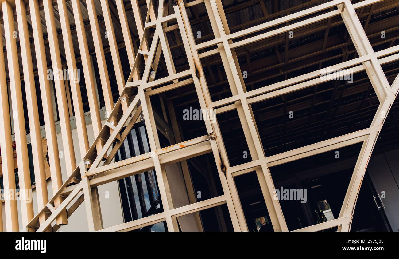A structure featuring wooden slats on construction site contributing to ...