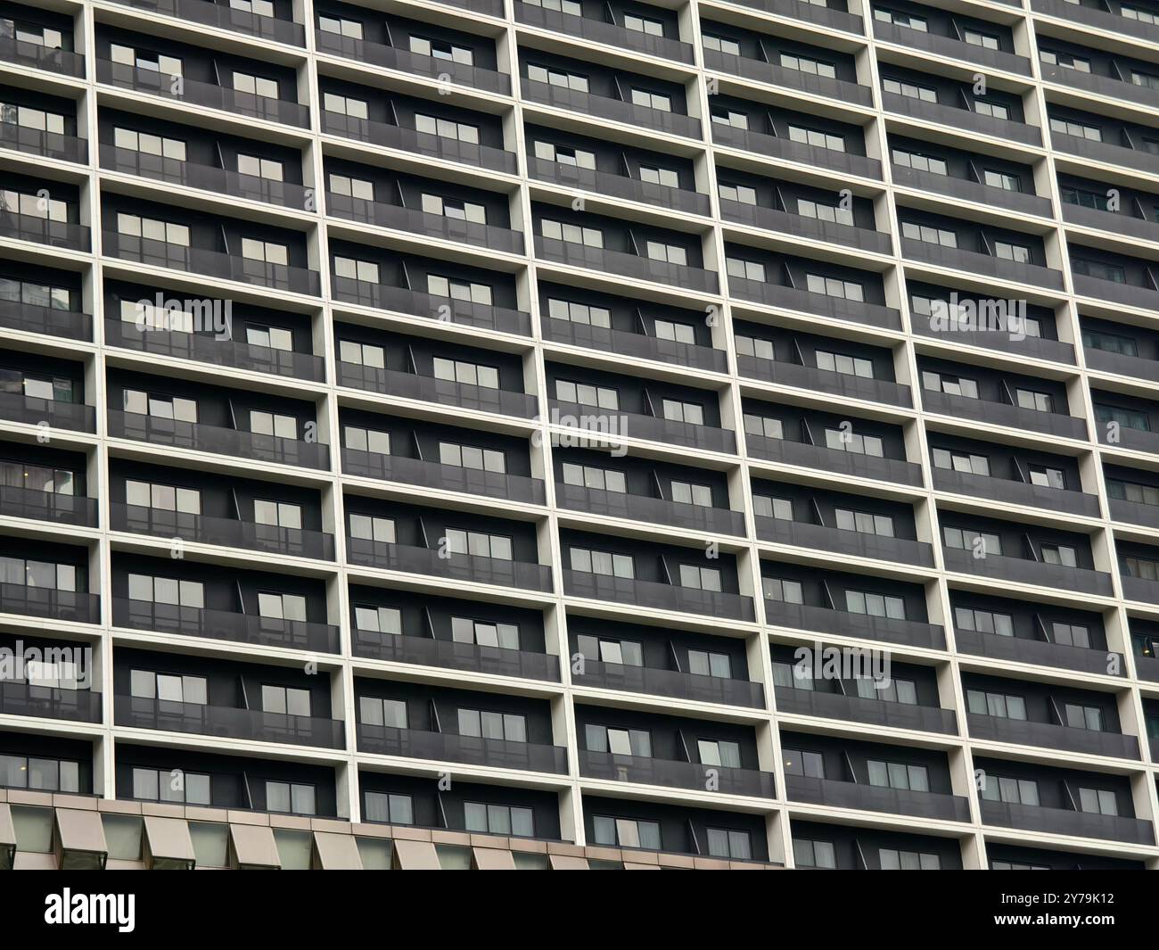 A very large and impressive building featuring many balconies and ...