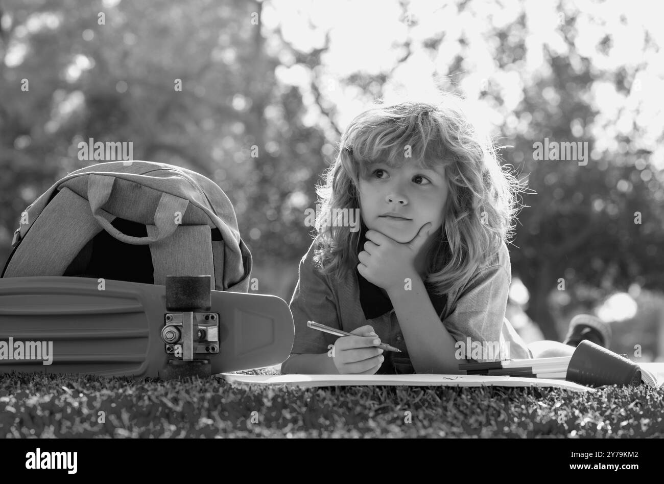 Little boy with brush paint painting. Kid artist painter draw pictures ...
