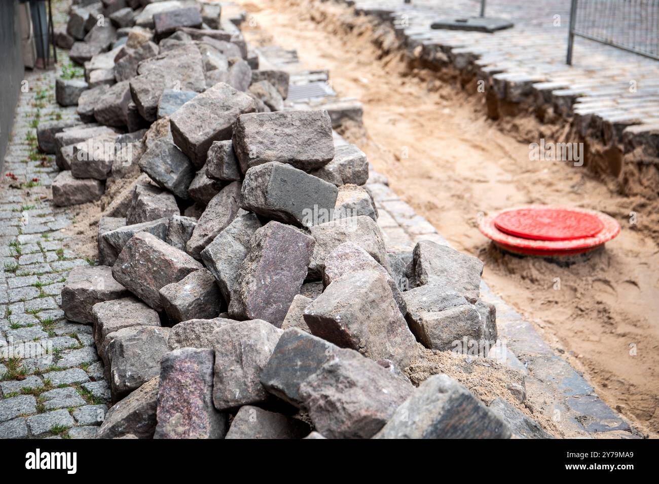 Pedestrian sidewalk repair. Paving works and utilities Stock Photo - Alamy