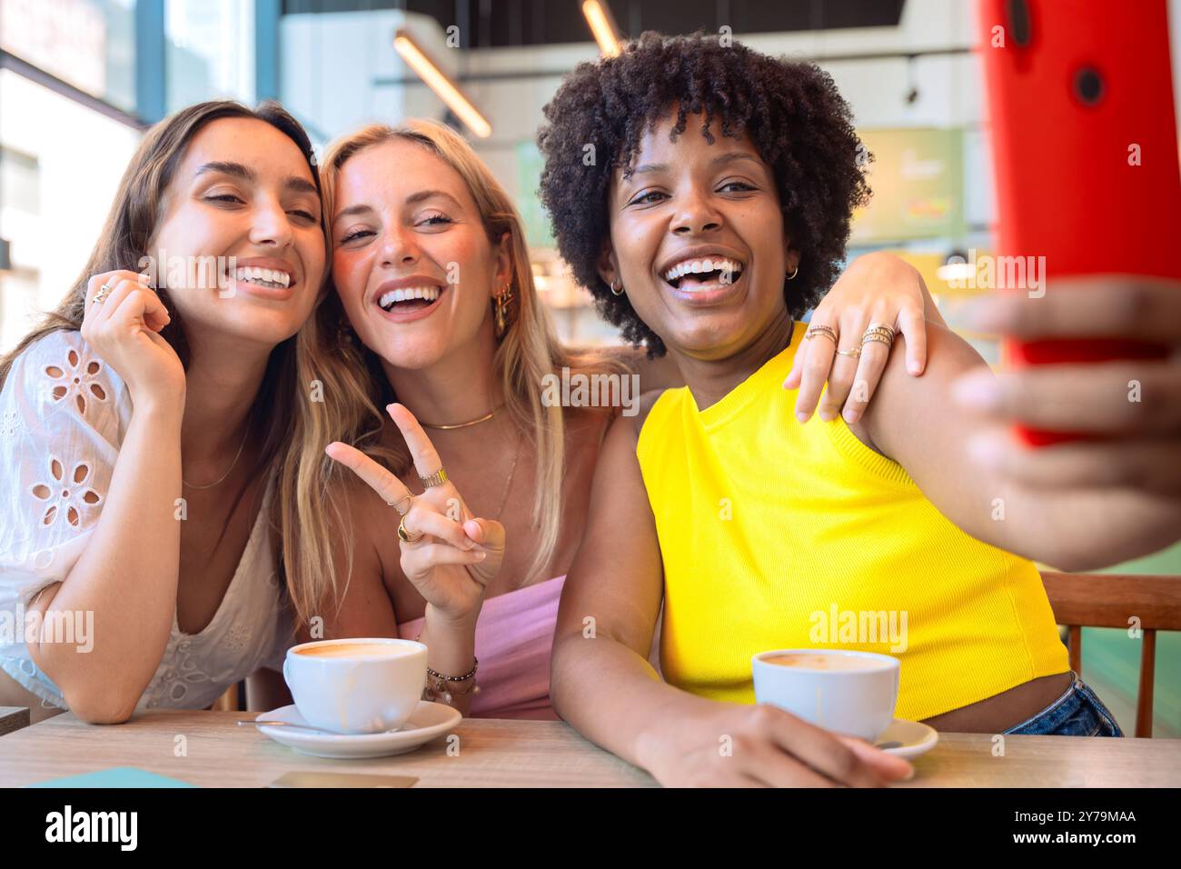 Three women friends women only coffee hi-res stock photography and ...
