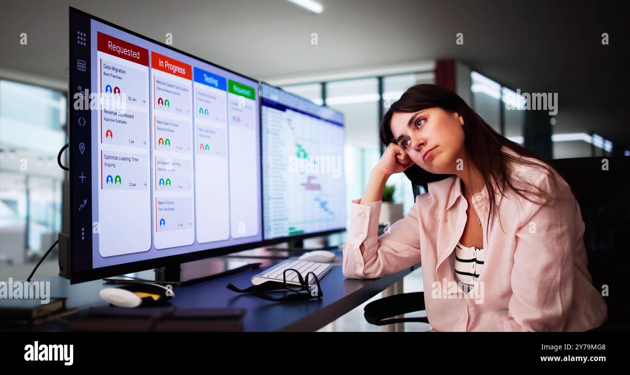 Tired Lazy Woman At Office Desk. Bored Employee Stock Photo - Alamy