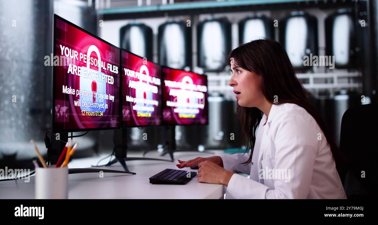 Ransomware Cyber Attack Breach. Hacked Alcohol Production Factory Stock ...