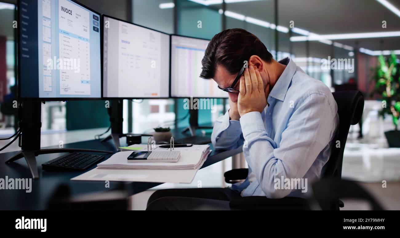 Sad Frustrated Accountant Man With Invoice Workload Stock Photo - Alamy