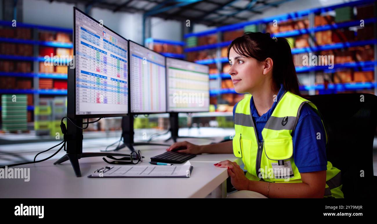 Warehouse Inventory Management On Computer. Staff In Office Stock Photo ...