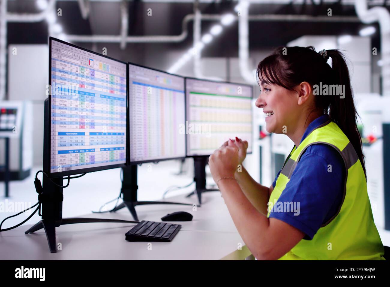 Industrial Automation Monitor At Manufacturing Factory. Women Using ...