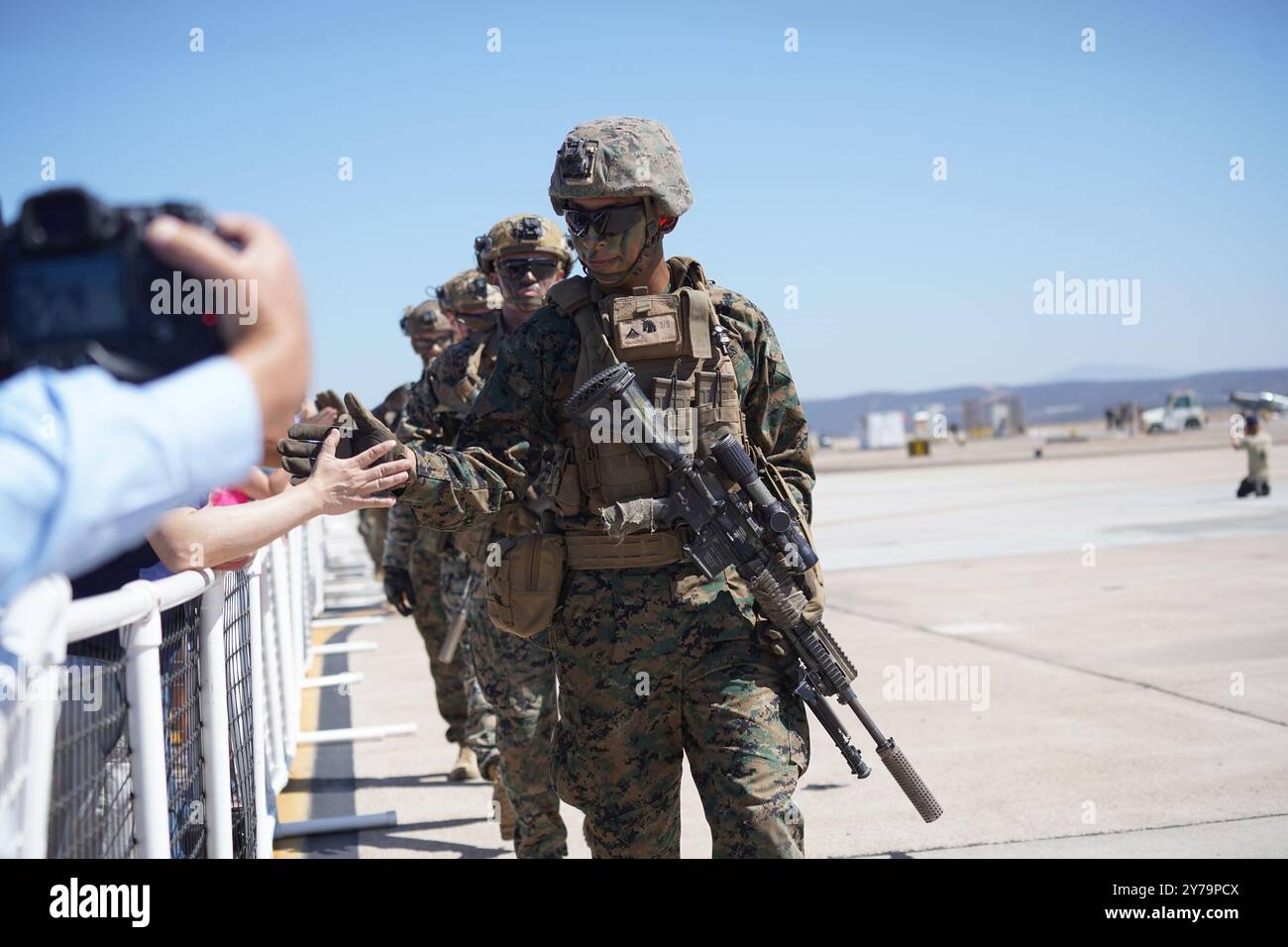 San Diego, United States. 28th Sep, 2024. The soldiers high five with ...