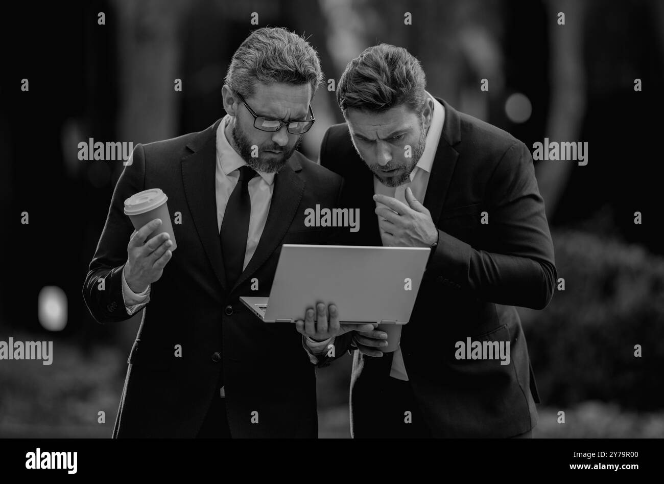 Discuss finance Black and White Stock Photos & Images - Alamy