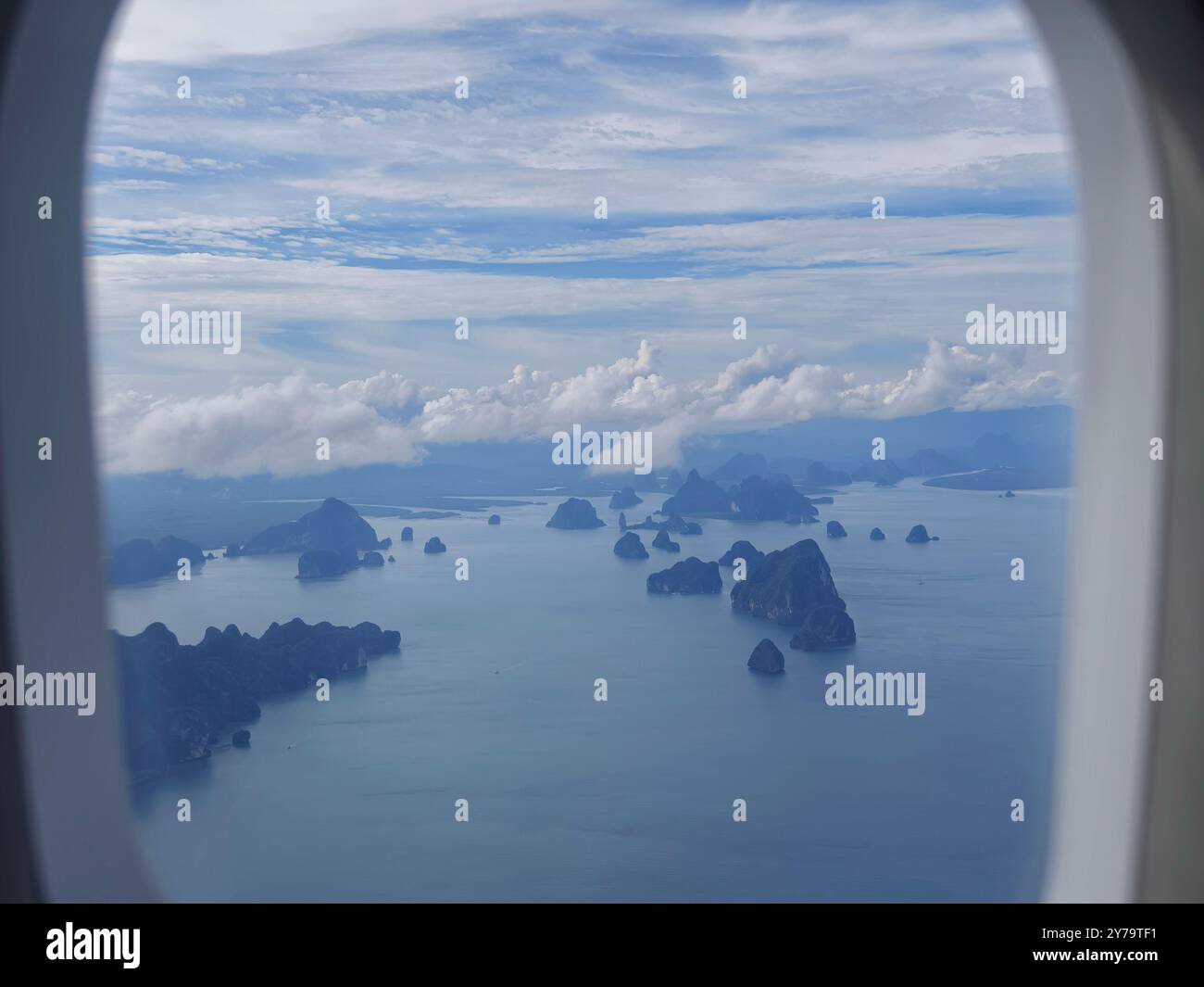 A breathtaking view of the vast ocean as seen from an airplane window ...