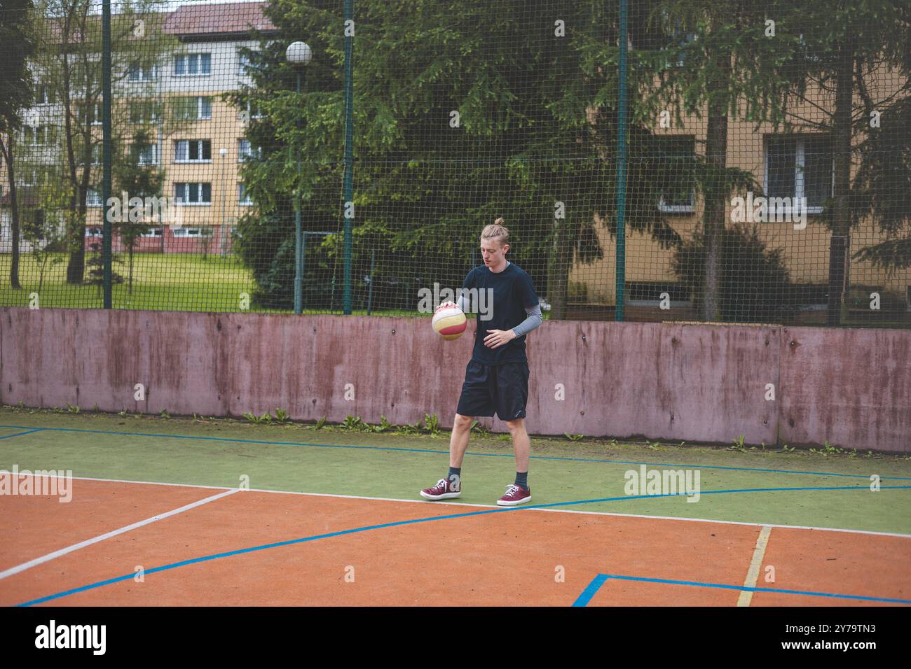 Basketball player controls and dribble the ball during a casual game on ...