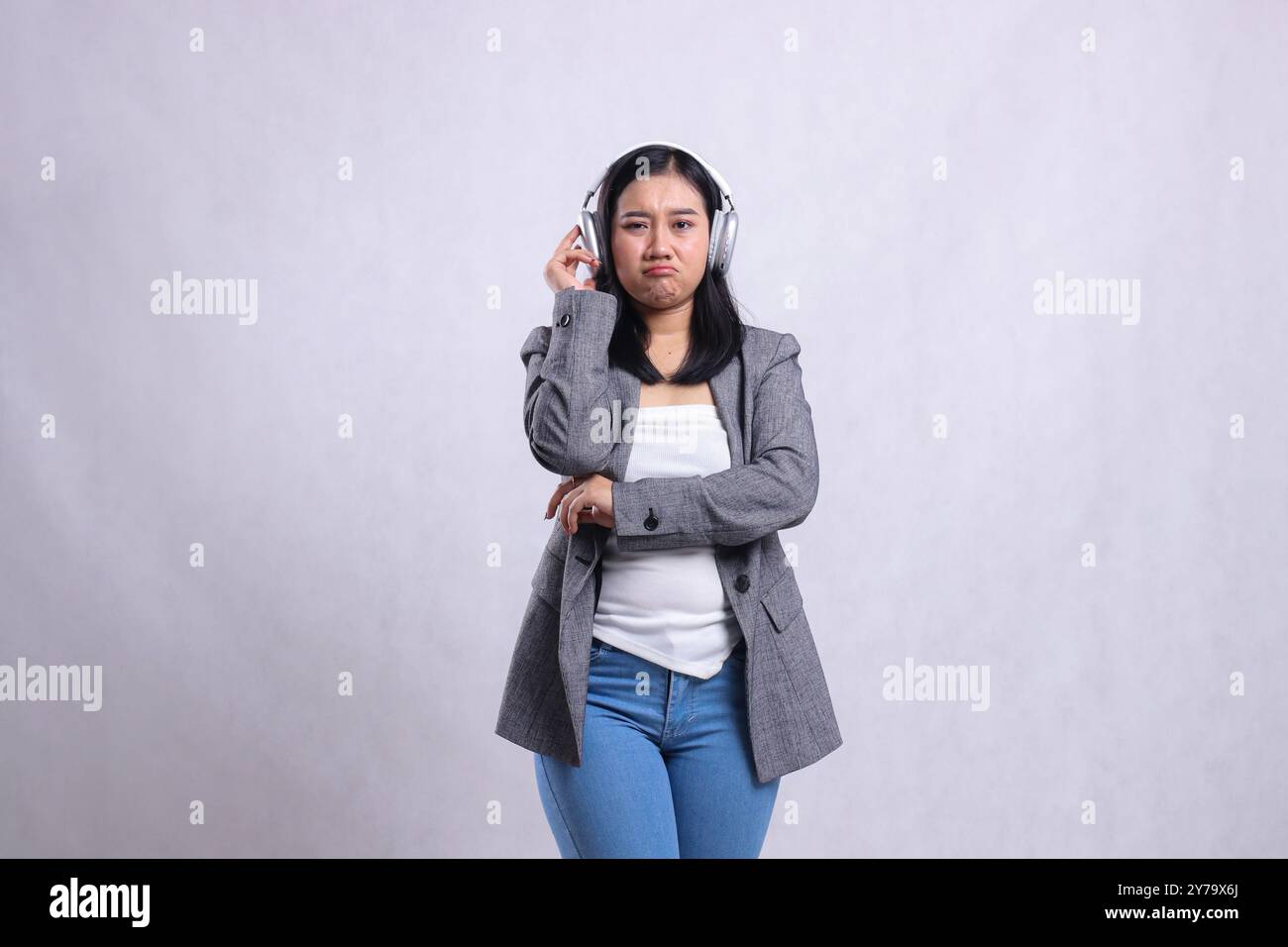 beautiful young woman indonesia office sad embrace holding and wearing ...