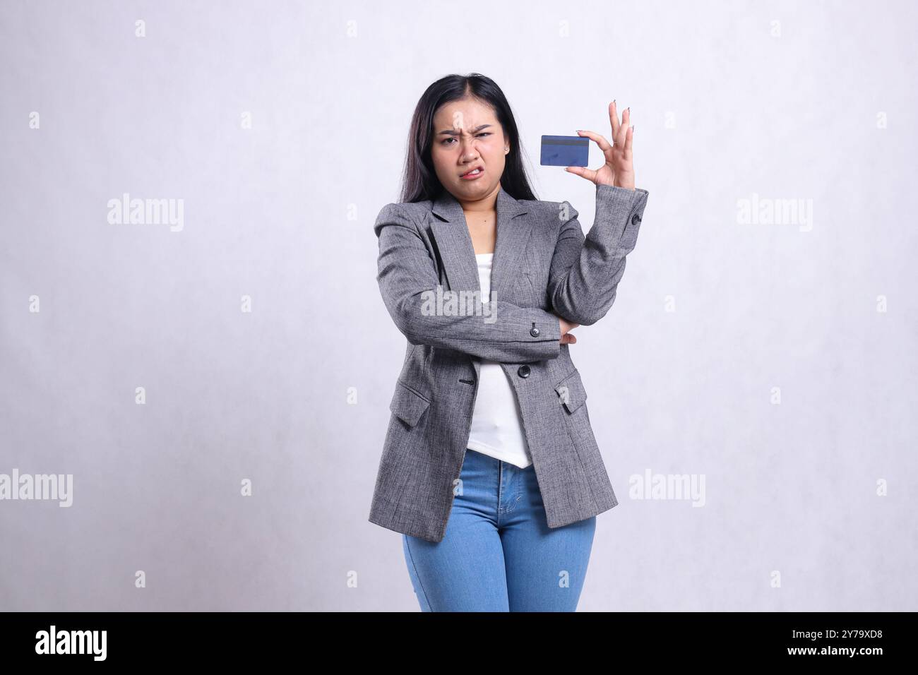 beauty young office woman disgusted wink eyes embrace holding debit ...