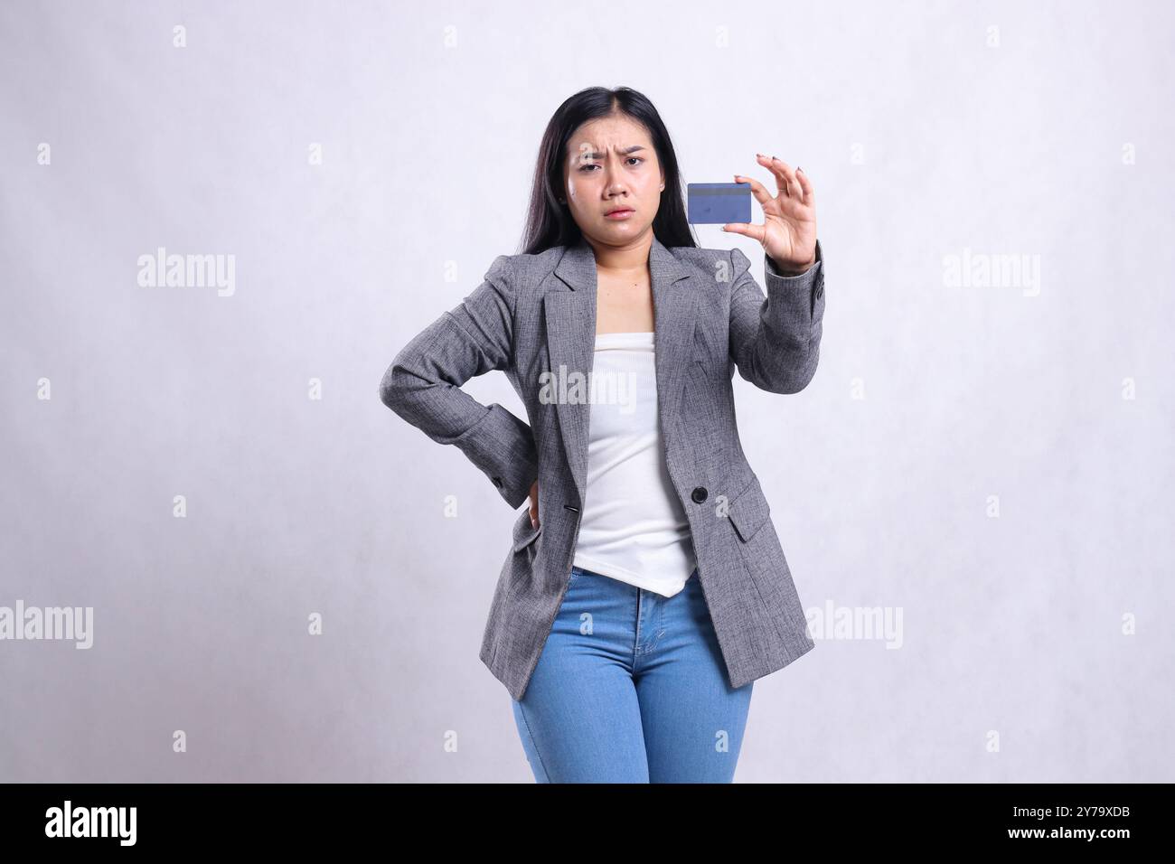 expression of beautiful young office female sad hold waist and debit ...