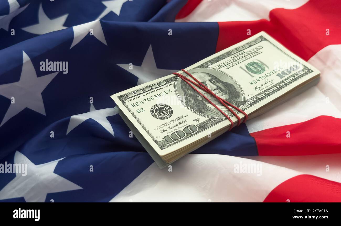 One hundred dollars banknotes on flag background Stock Photo - Alamy