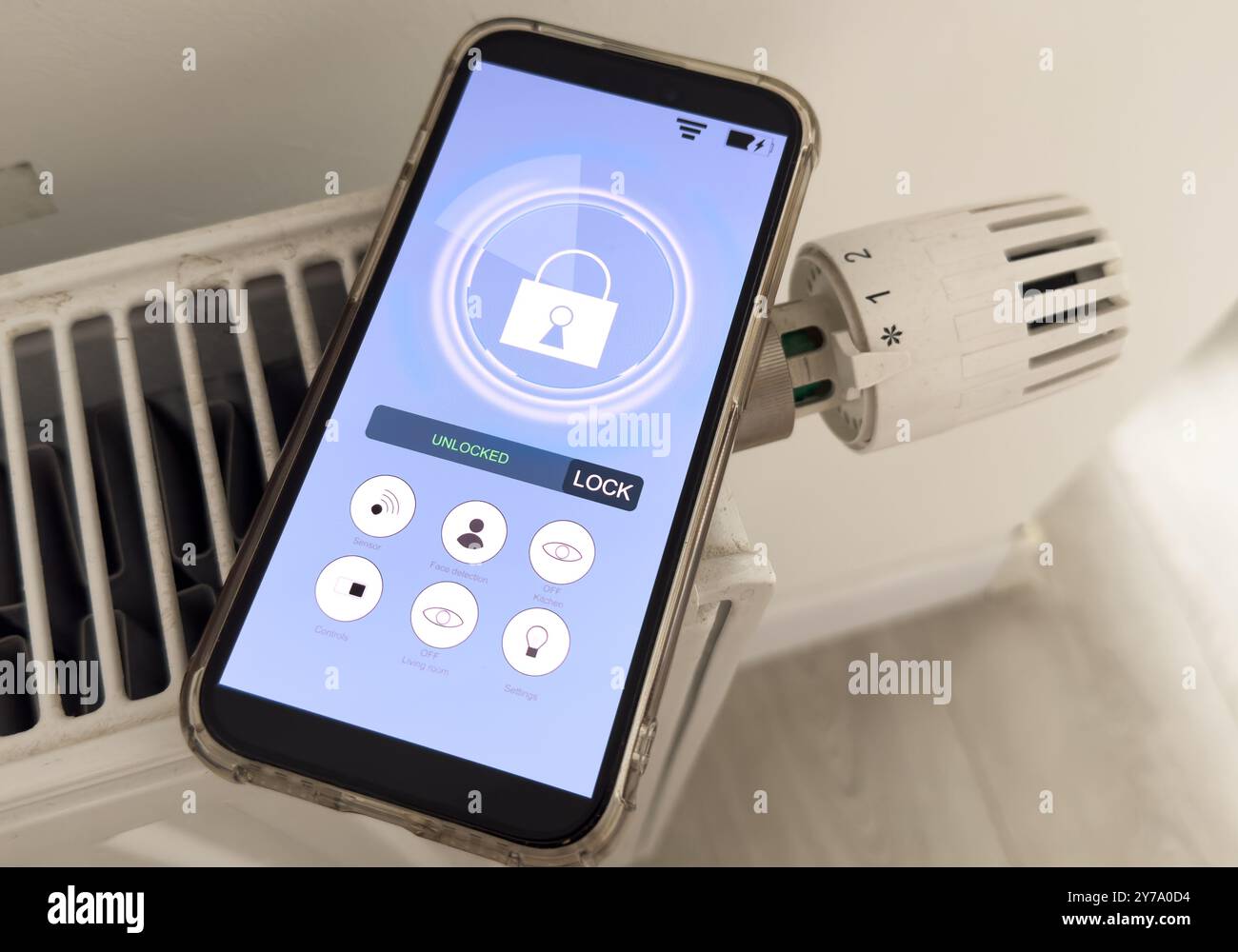 Smart home control concept. adjusting temperature with smartphone Stock ...