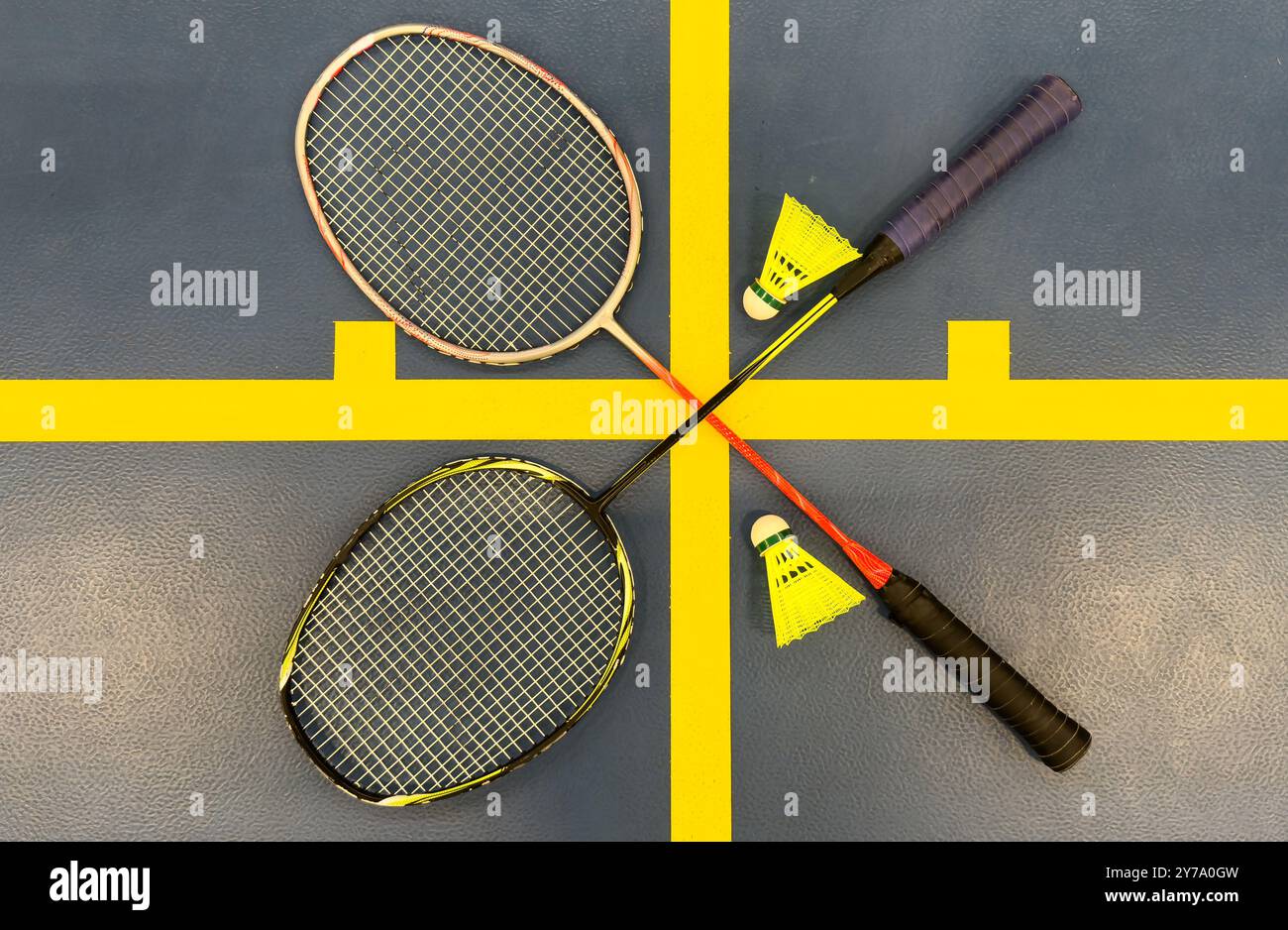 Shuttlecock on badminton racquet on floor Stock Photo - Alamy