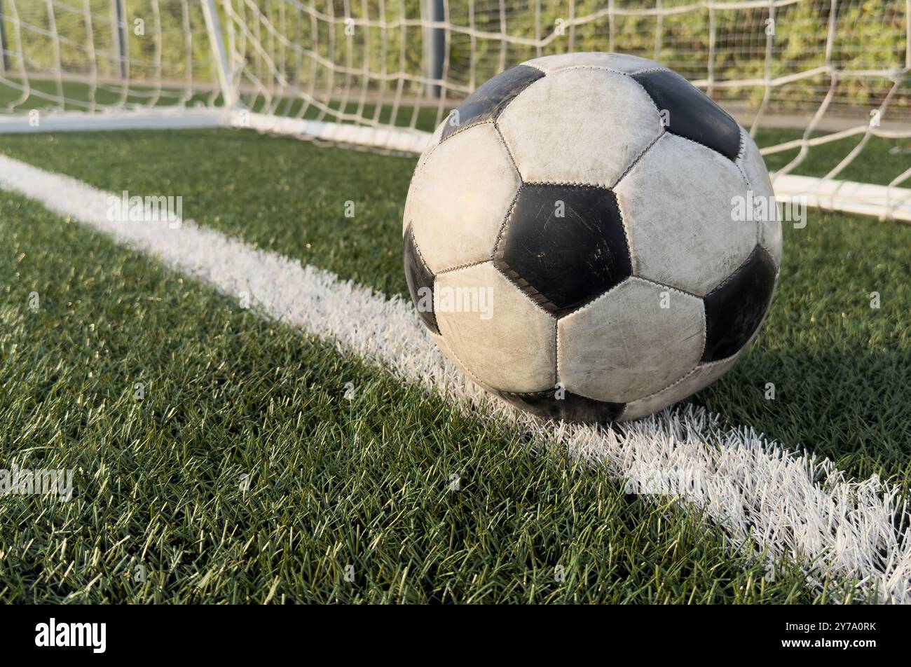 Traditional soccer ball on soccer field Stock Photo - Alamy