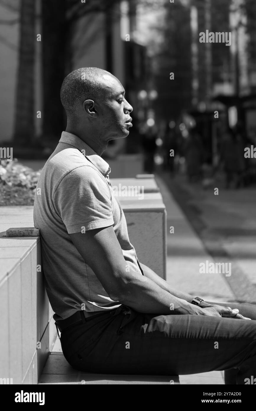 African american man meditating outdoor doing breath practice, sitting ...