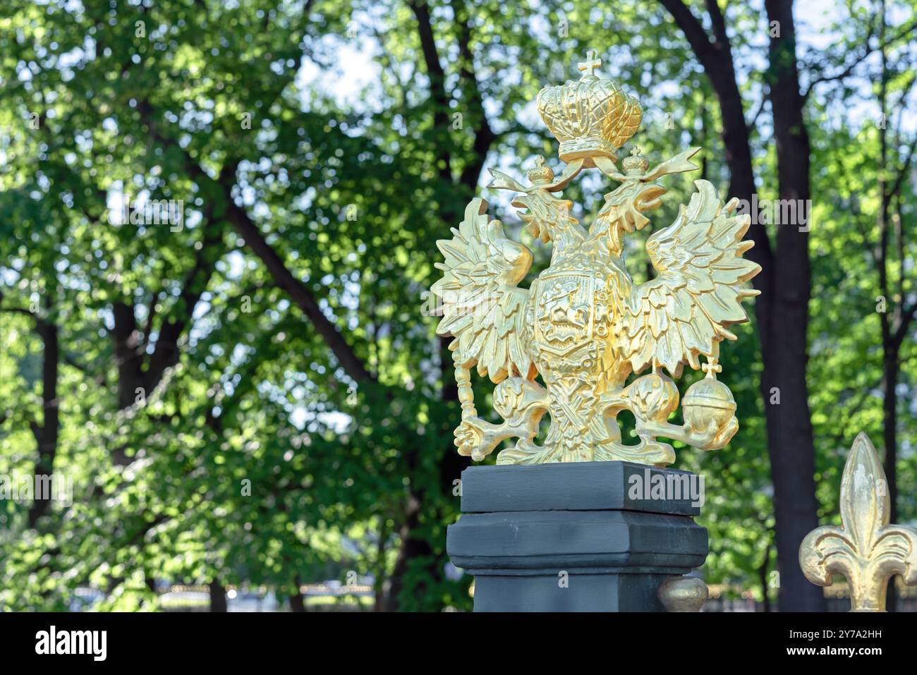 Sculpture of a gilded double-headed eagle, the coat of arms of the Russian Empire Stock Photo ...