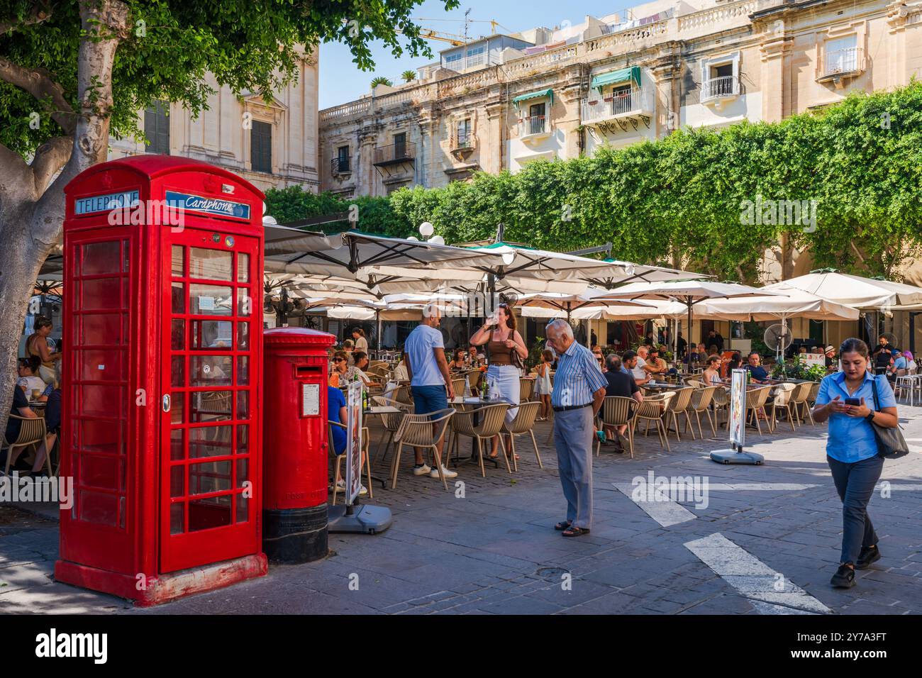 VALLETTA, MALTA - AUGUST 30 2024: People enjoy summer vacation in Valletta. The capital of Malta ...