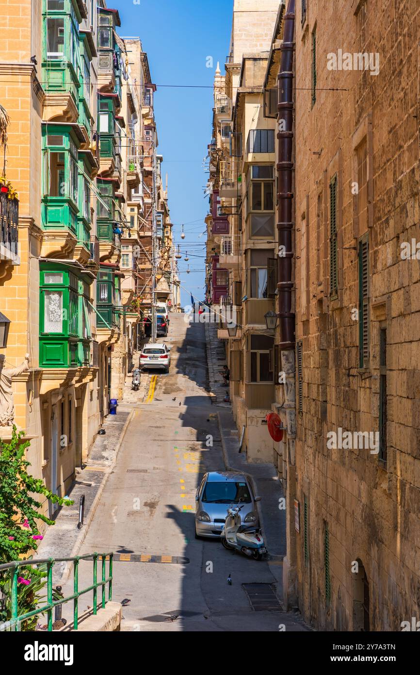 VALLETTA, MALTA - AUGUST 30 2024: Narrow street in Valletta with ...