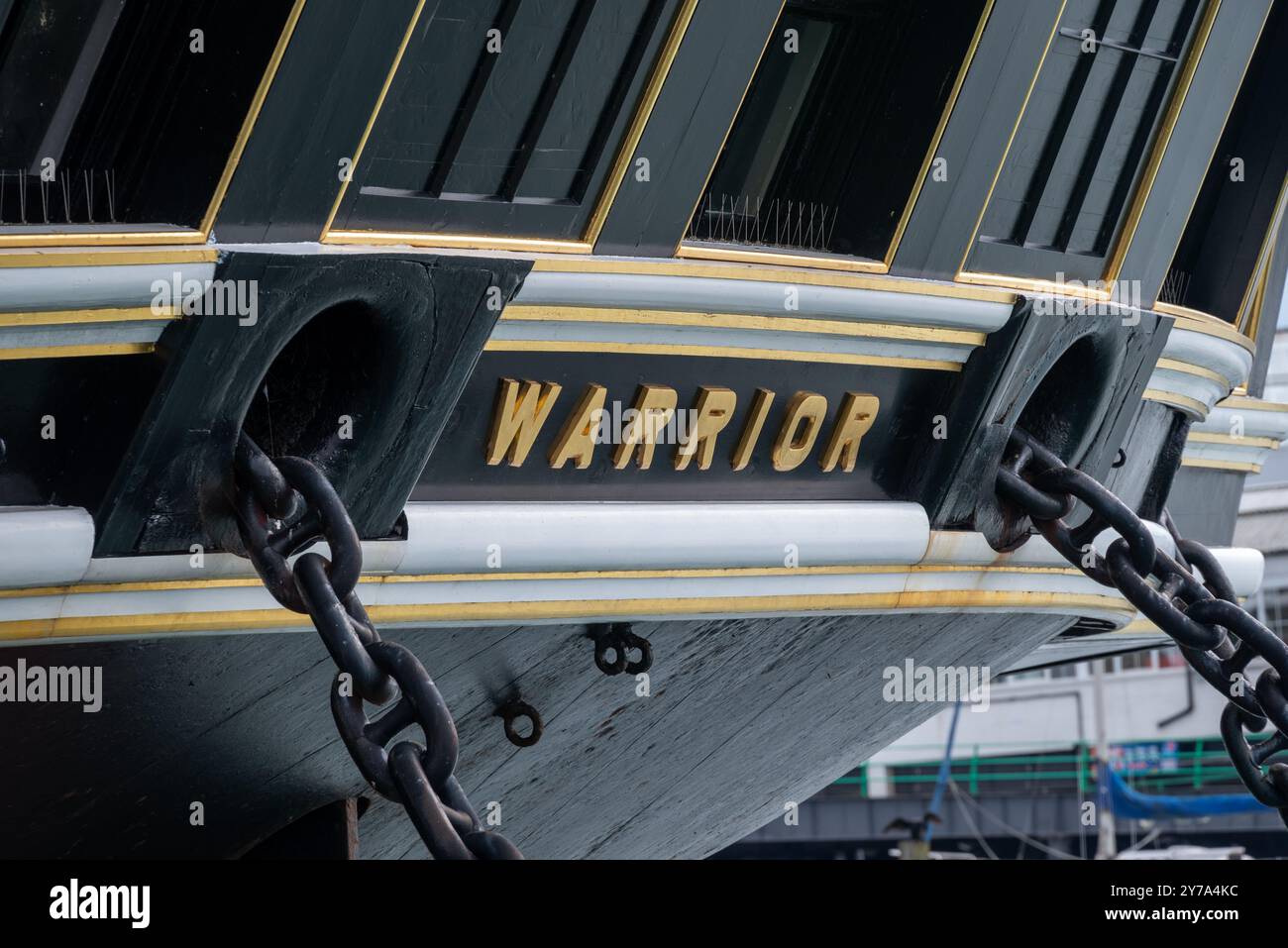 Stern or HMS Warrior with name plate and anchor chains. September 2024 ...