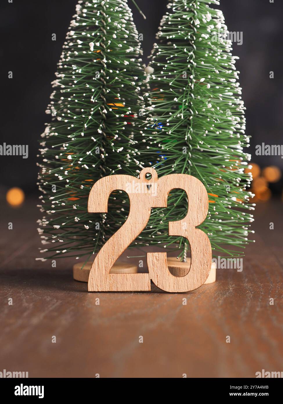 Twenty third December Wooden number twenty third with Christmas trees ...