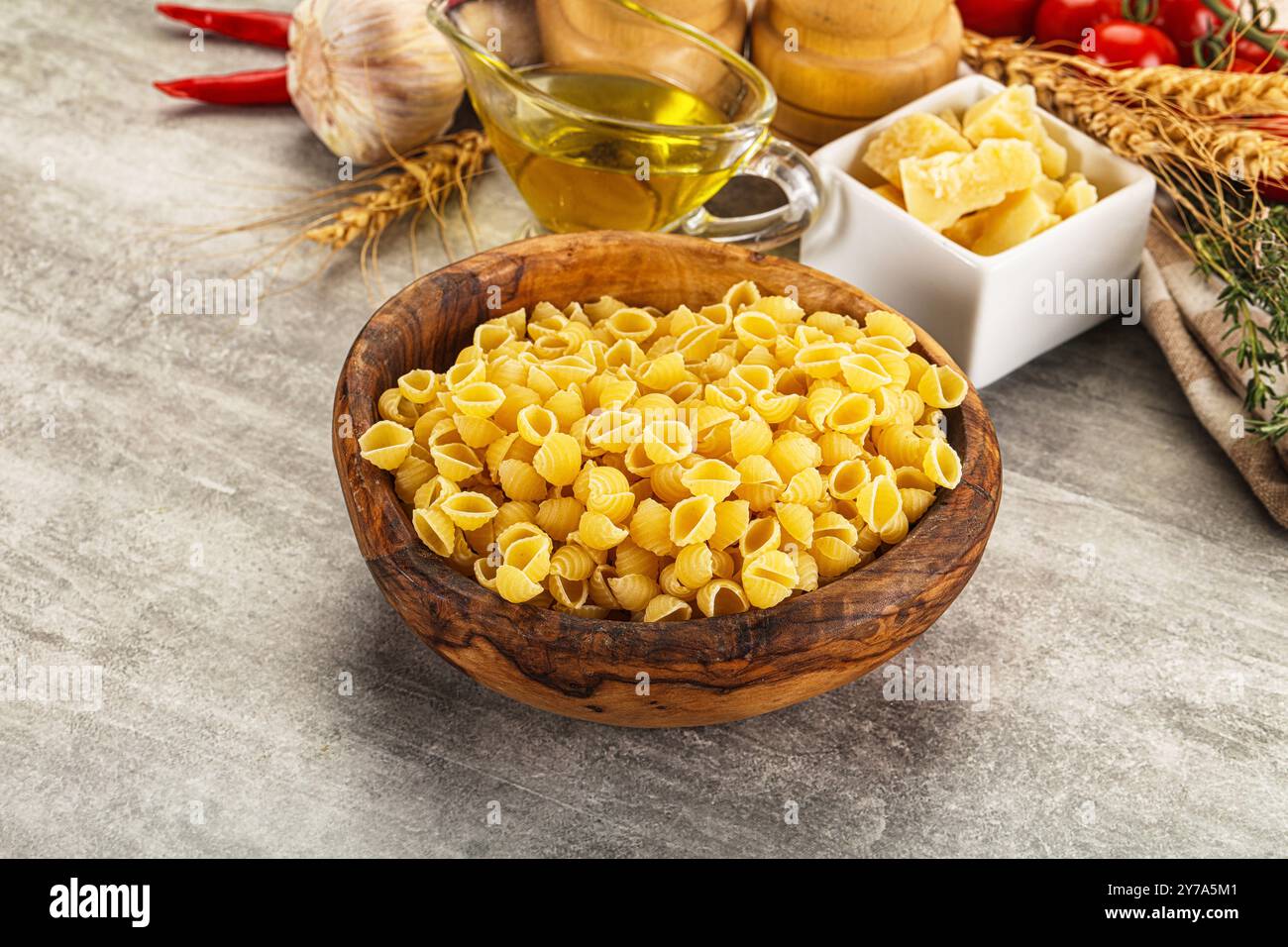 Italian cuisine - dry conchiglie shell pasta Stock Photo - Alamy