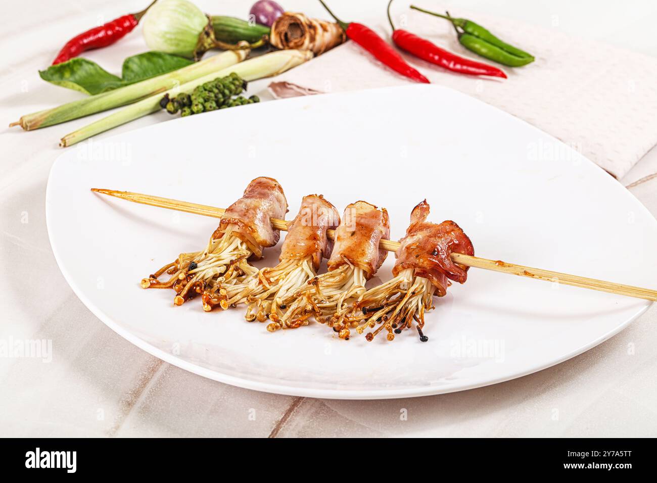 Thai Street foof satay with bacon and mushroom enoki skewer Stock Photo ...