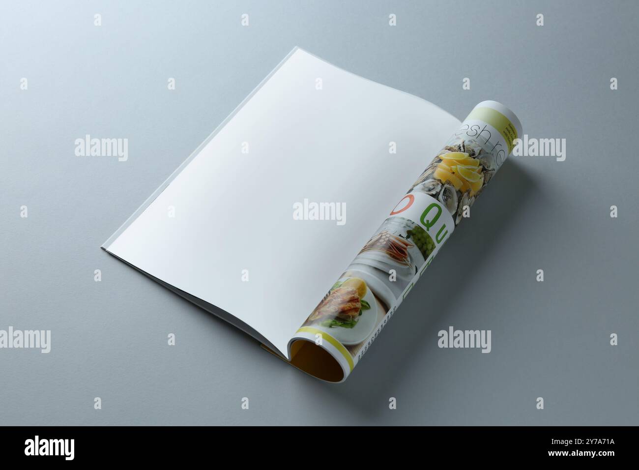 Open magazine on grey background. Mockup for design Stock Photo - Alamy