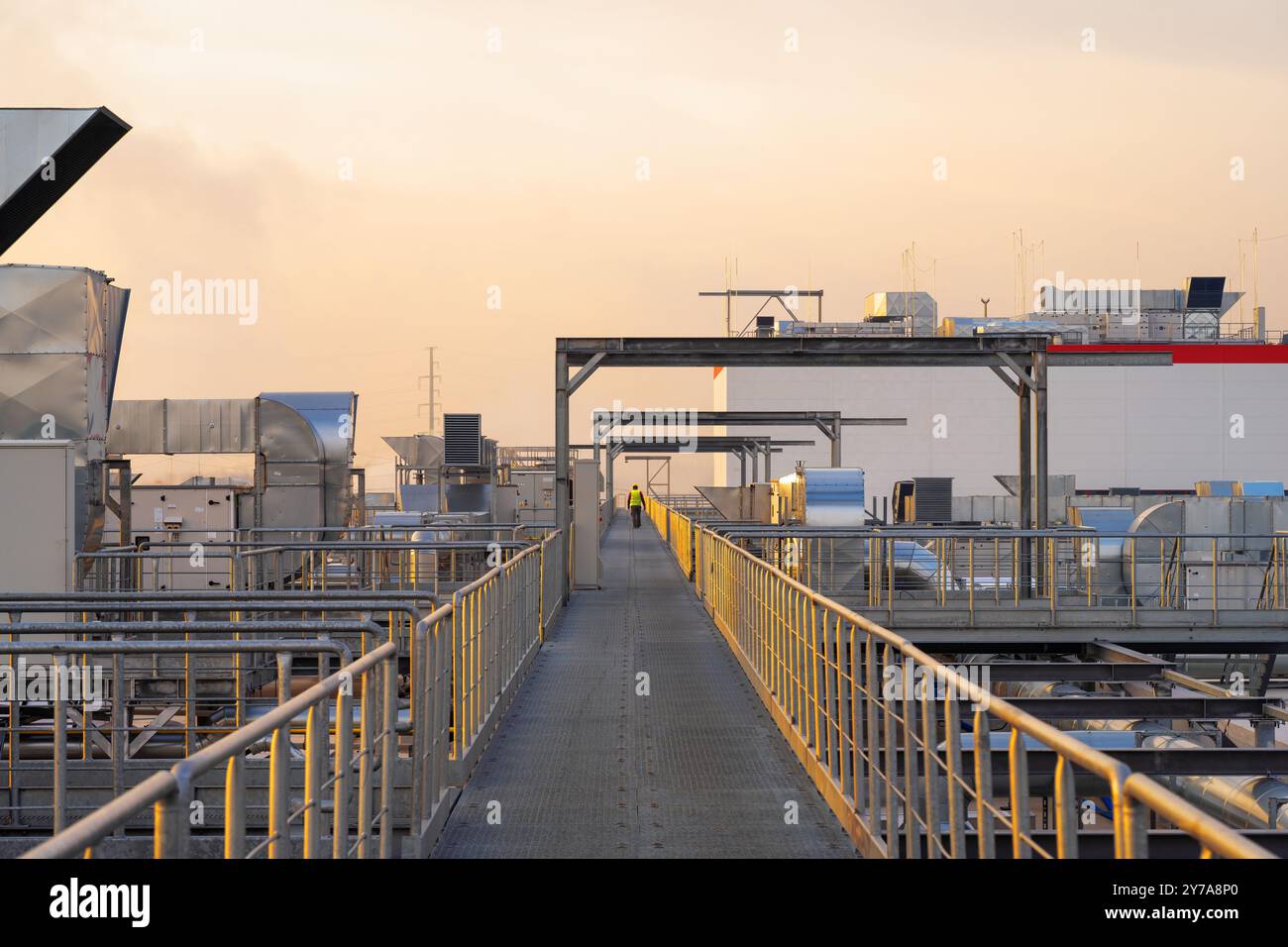 Service worker on their way to working place on the roof with ...