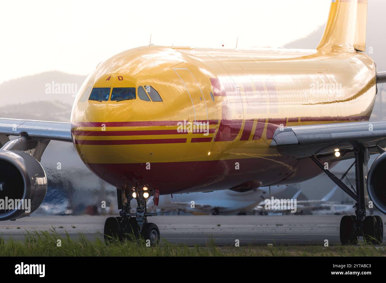 Larnaca, Cyprus - May 24, 2024: Yellow DHL cargo airplane on the runway ...
