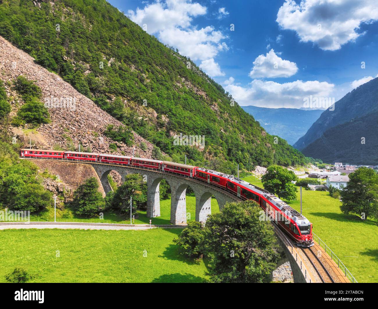 Aerial view of a Bernina Express train crossing the Brusio spiral ...