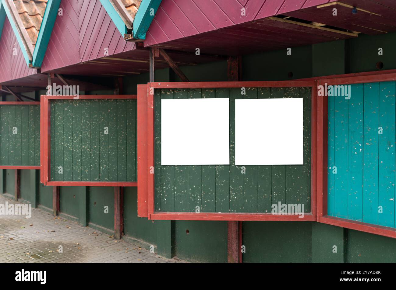 Two blank message boards stand at a market, waiting for new ...
