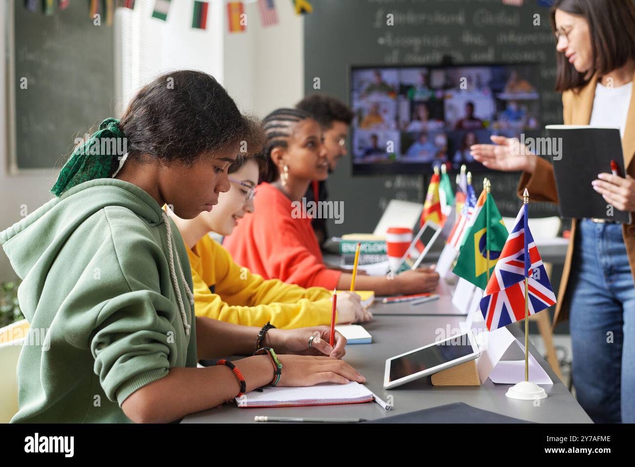 Black Girl with Multicultural Students in Class Stock Photo - Alamy